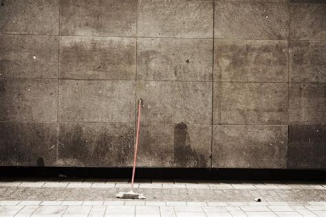 Premium Photo Mop Against The Wall