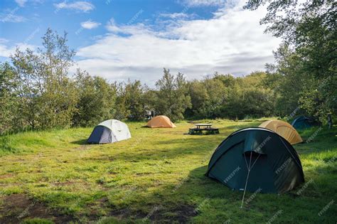 Premium Photo Group Of Hiker Tents Camping On Lawn Of Campground In