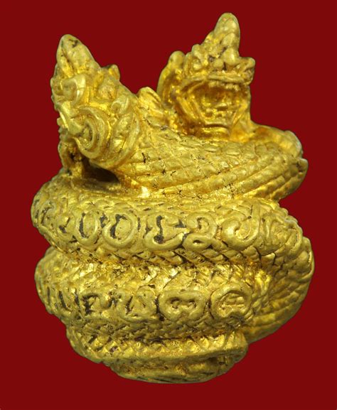 พญานาคเกี้ยวรุ่นแรก ปี 2545 แบบชุบทอง หลวงปู่คำพัน โฆสปัญโญ วัดธาตุมหาชัย นครพนม สภาพยังสวย หา