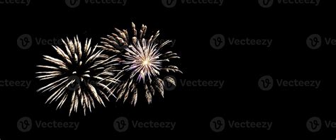 Two Big Fireworks And One Small Fireworks In The Night Sky 19829136