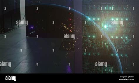 Image Of Globe Over Server Room Cloud Computing And Data Processing Concept Digitally Generated