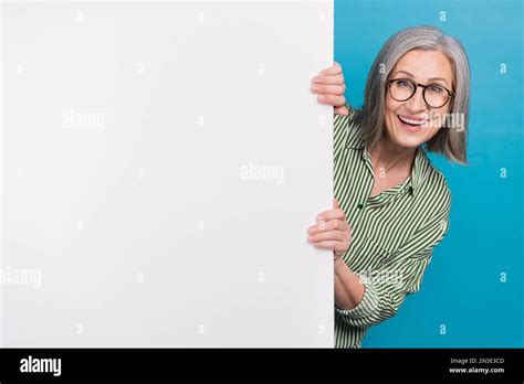 Photo Advertisement Poster Of Mature Aged Senior Promoter Marketer Lady Hide Behind Placard Her