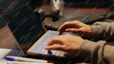 Premium Photo Young Man Hacking Password To Break Server Security Using Virus To Infect