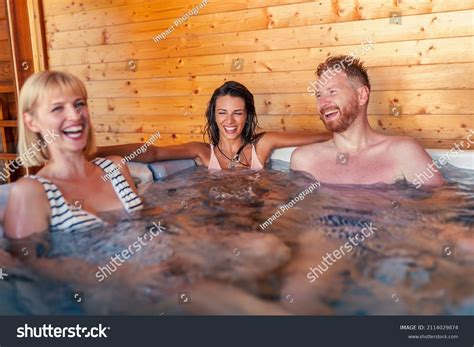 101 Group Of Friends Relaxing In A Luxurious Hot Tub Images Stock