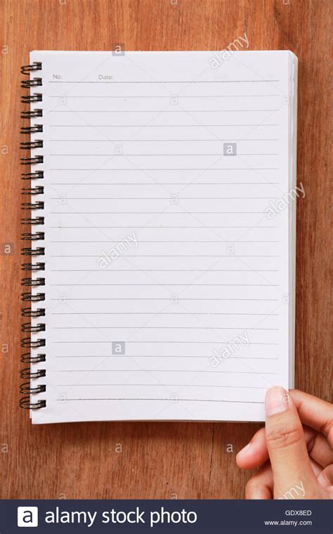 Handle Notepad With A Spiral Binding On Wood Table Stock Photo Alamy