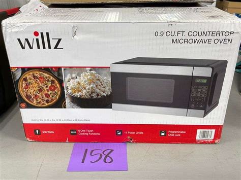 Willz 09cu Ft Countertop Microwave Oven In Box Earls Auction Company