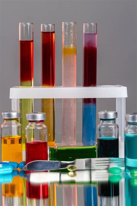 Test Tubes And Bottles With Various Colored Liquids Stock Image