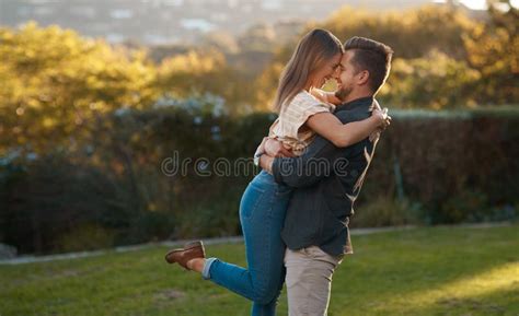 Man Woman And Excited Hug In Park For Marriage Anniversary For