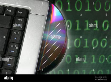 Keyboard Cd Binary Code Keyboards Cds Dvd Dvds Binary Codes Stock Photo Alamy