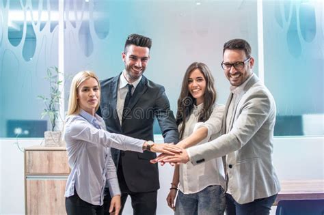Successful Business Professionals Showing Unity With Their Hands Successful Business Professionals Showing Unity With Their Hands