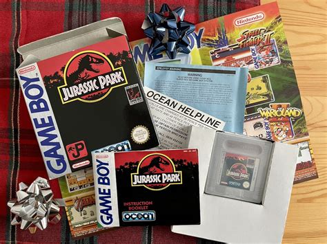 Handheld Jurassic Park Retro ‘raptors Oink Blog