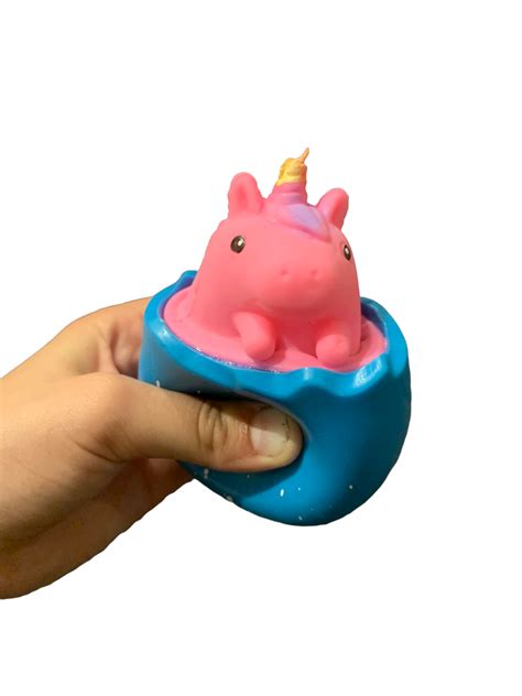 Squeezing Pop Up Unicorn Half Egg Assorted E Trains