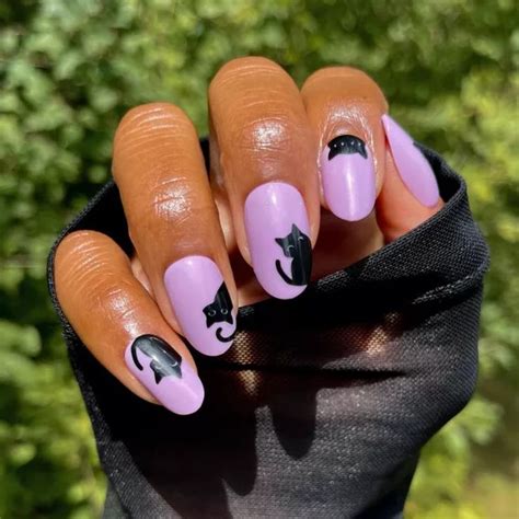 12 Black Cat Nail Ideas For An Unexpected Halloween Mani Cat Nails