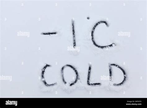 Drawn On The Snow Temperature Symbols Denoting Negative Very Cold Weather Which Is Marked In