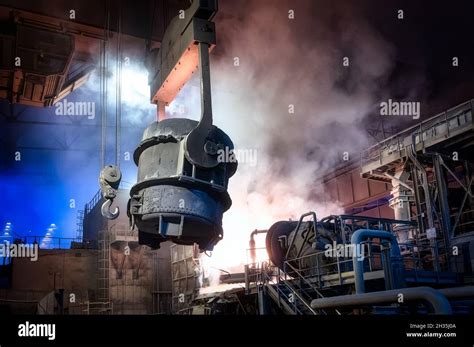 Metallurgical Ladle With Molten Metal Near Steelmaking Furnace Stock