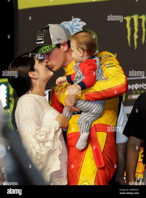 Joey Logano Kisses His Wife Brittany Baca As He Holds Their Son Hudson