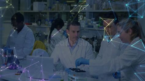 In School Scientists Working With Digital Animation Overlay On Network