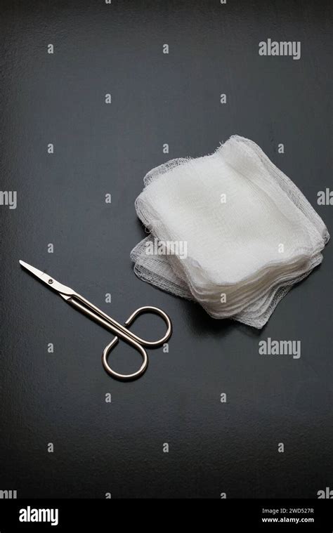 The Gauze And Scissors Used To Control Bleeding For First Aid Stock