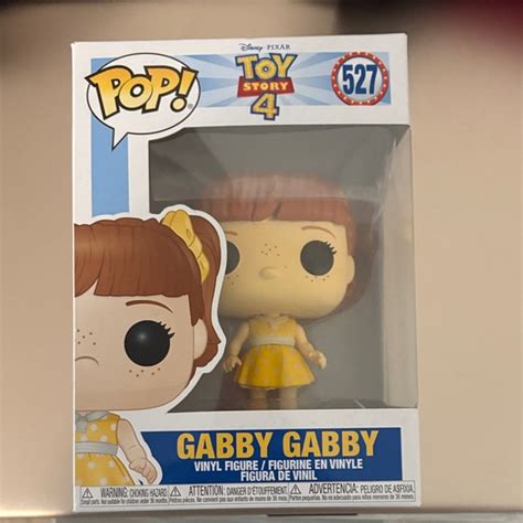Funko Toys Funko Pop Gabby Gabby Vinyl Figure Yellow And Brown