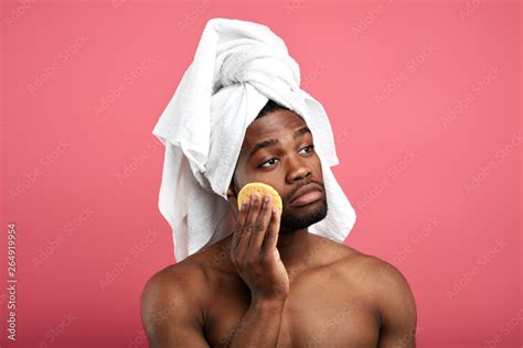 Romantic Serious Man With A Pad On His Cheek Looking Aside Close Up Photo Isolated Pink
