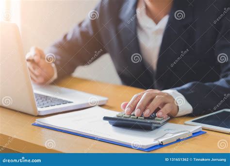 Businessmen Analyzing Stats Financial Data On Pc Laptop Pointing At