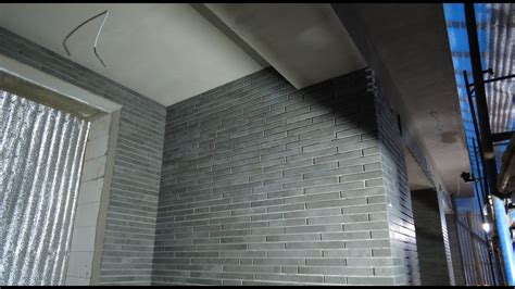 СФТК Мокрый Фасад с плиточной облицовкой ригельной плиткой зимой в тепляках резанный