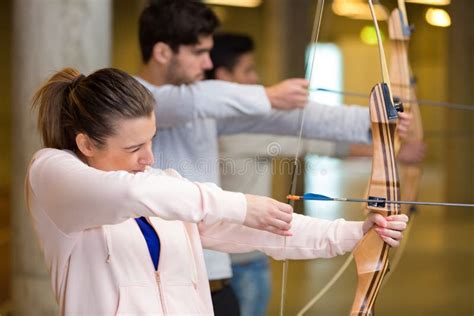 Row People Aiming With Their Archery Bows Stock Image Image Of Hold