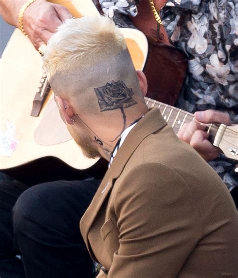 Blond Zayn Malik Reveals Rose Head Tattoo After Gigi Hadid Split