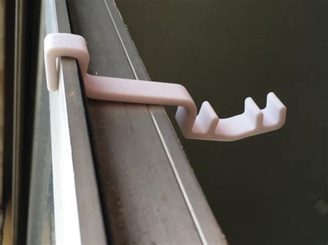 Two Position Window Holder Slightly Open Whilst Avoiding The Wind Bashing The Window Around