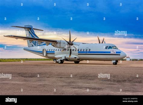 Propeller Plane Passenger Transport Parked In The Runway For Refueling
