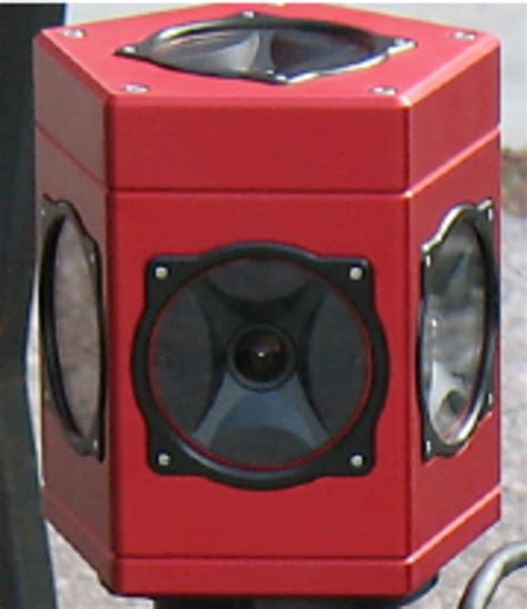 example images with tracked objects marked by red rectangles