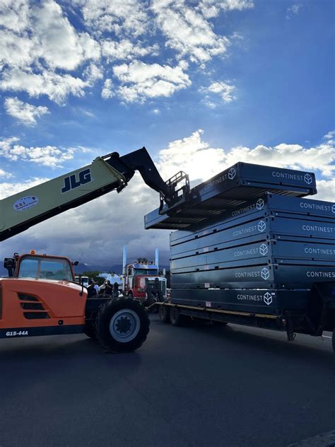 a container city on the island of maui is being built from foldable