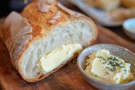 Artisan Baguette With Butter Premium Ai Generated Image