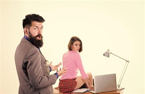 Premium Photo She Makes Him Crazy Man Boss Enter Office Of Sexy Girl Working Laptop Office