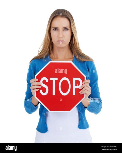 Woman Studio Portrait And Holding Stop Sign In Hands For Serious