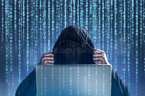 Unrecognizable Hacker In Hood Hacking And Attacking Security System