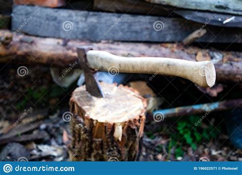 Close Up View Of An Axe Stuck In Log Stock Image Image Of Metal Close
