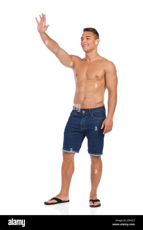 Half Naked Fit Man In Jeans Shorts And Black Flip Flops Standing Looking Away And Waving Full