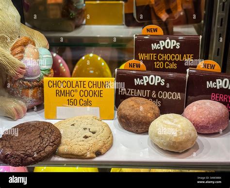 A Display Of Desserts At Mcdonalds Featuring Cookies And Mcpops In Various Flavors Such As