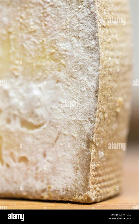 Moldy Cheese Close Up Molded Slice Of Comte Cheese On The Cutting