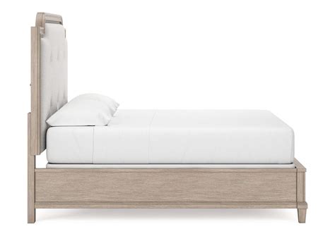 Jorlaina King Upholstered Panel Bed