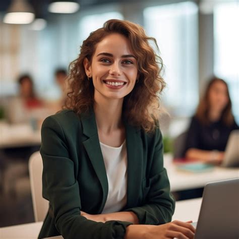 Premium Ai Image A Woman Is Smiling While Using A Laptop