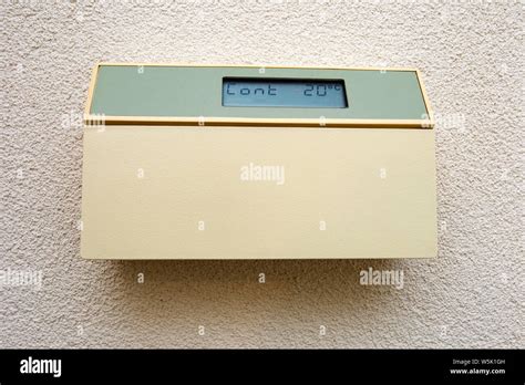 Digital Climate Control Thermostat In A House Stock Photo Alamy