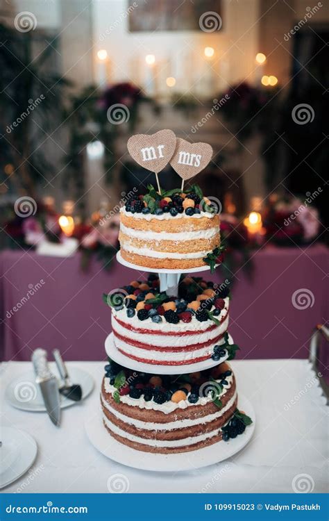Three Tiered Naked Wedding Cake With Blueberries Stock Image Image Of