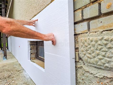Installing Rigid Styrofoam Insulation Board For Energy Saving Of The