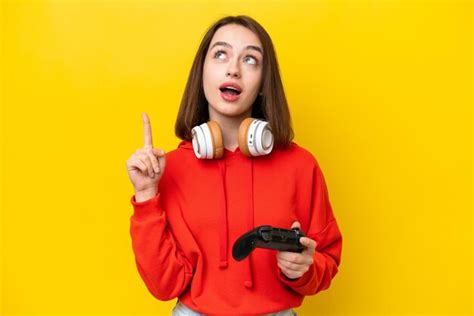 Premium Photo Young Ukrainian Woman Playing With A Video Game