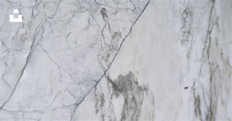 흰색 대리석 표면의 클로즈업 사진 Unsplash의 무료 대리석 이미지