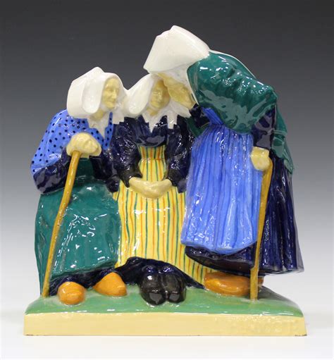 A Henriot Quimper Pottery Figure Group Modelled As Three Elderly