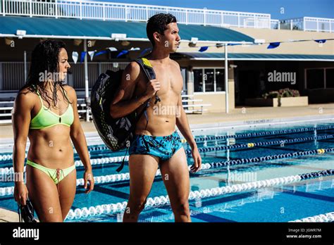 Swimmers Walking By Pool Stock Photo Alamy