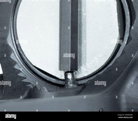 Assault Rifle Buffer Retainer Behind Pushed Down To Remove The Buffer Weight And Buffer Spring